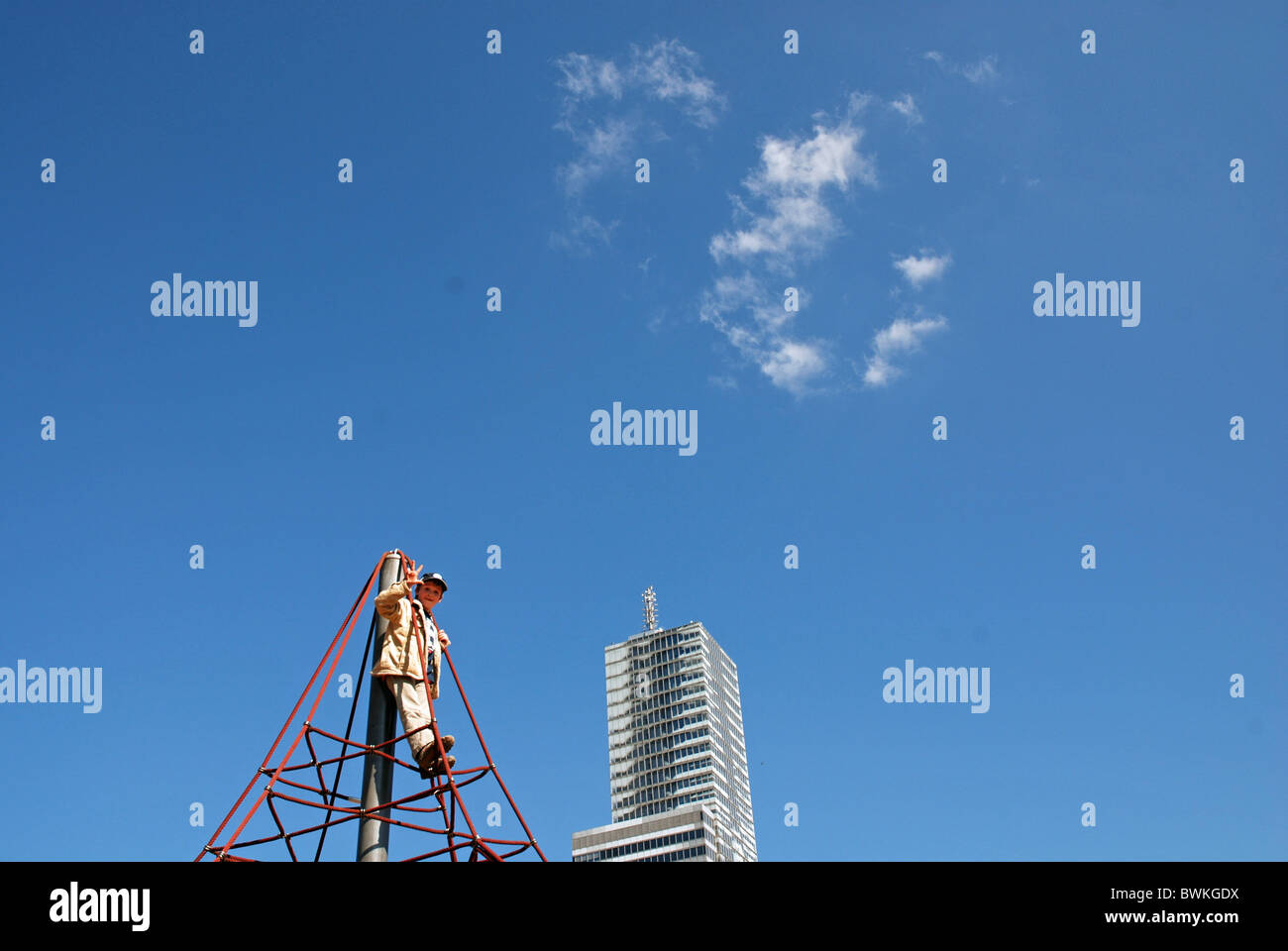 boy child boy climbing climbing scaffolding playground Cologne tower ...