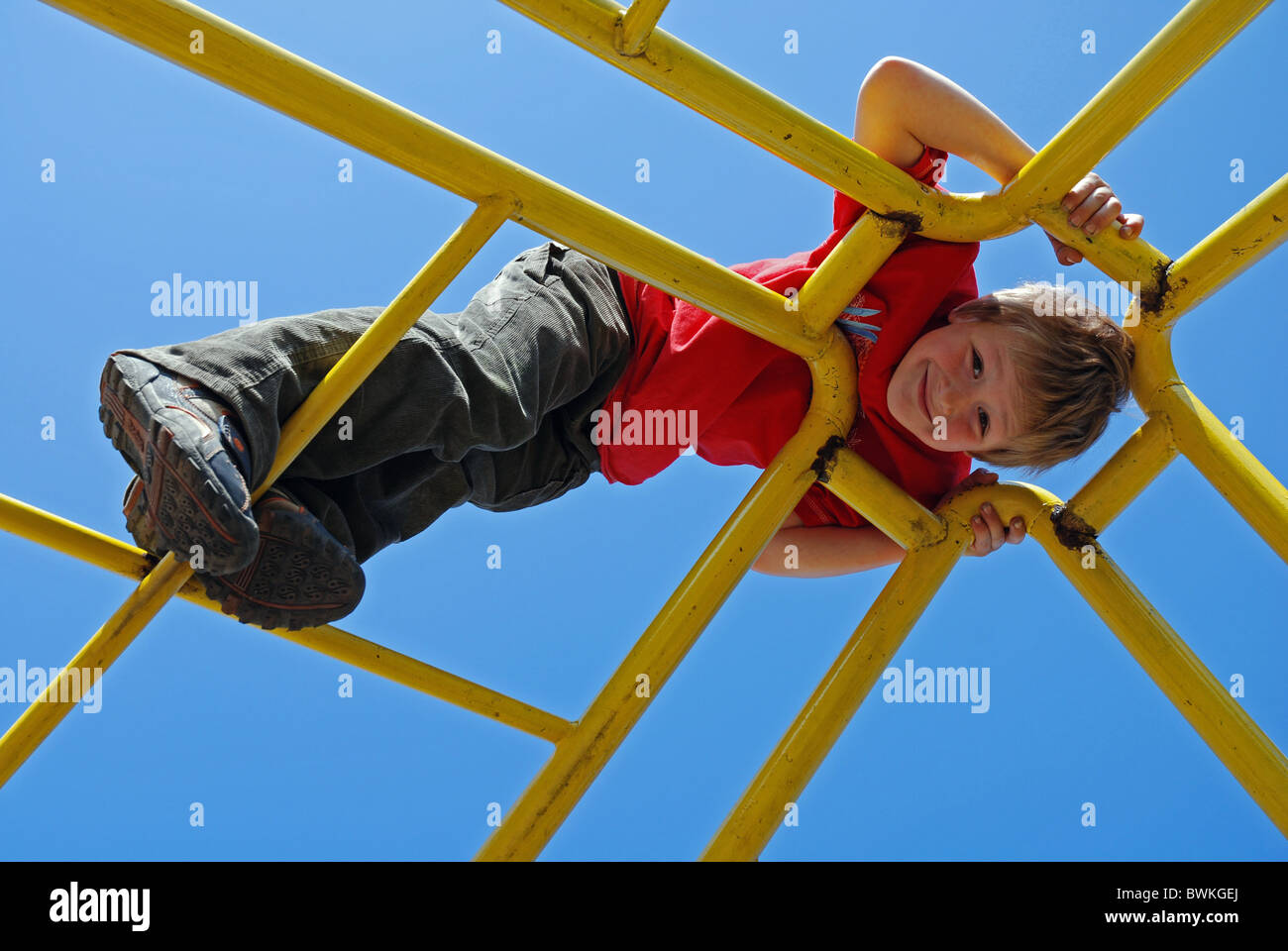 boy child boy Seven-year-old climbing scaffolding climbing scaffolding ...