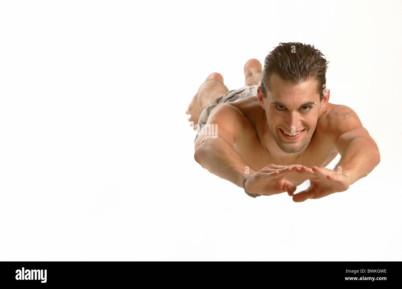 Fitness man training inside Cut Out Stock Images & Pictures - Alamy