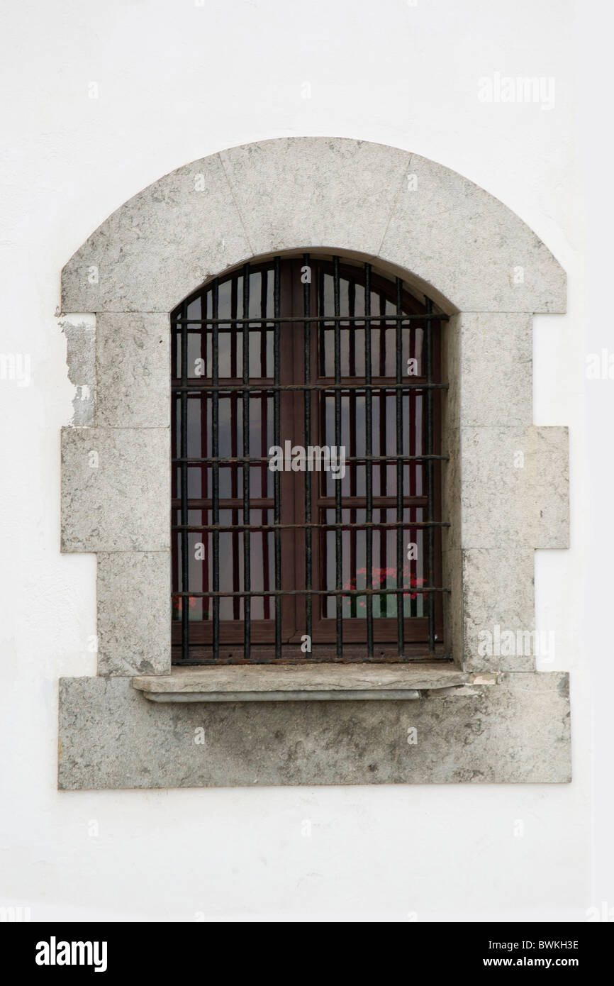 Antique window with bars and stone cill Stock Photo - Alamy