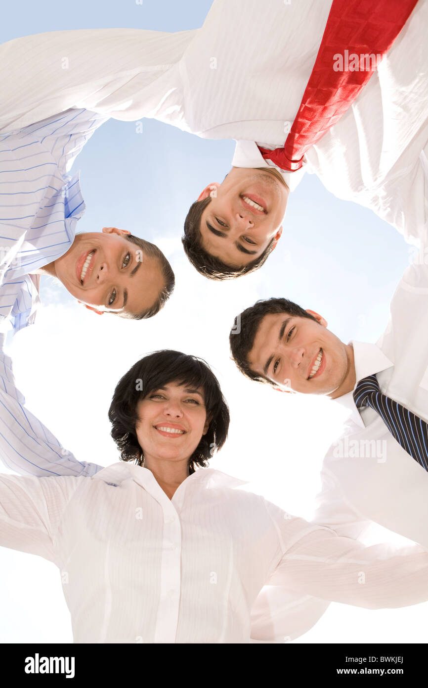 Team collaboration embracing hi-res stock photography and images - Alamy