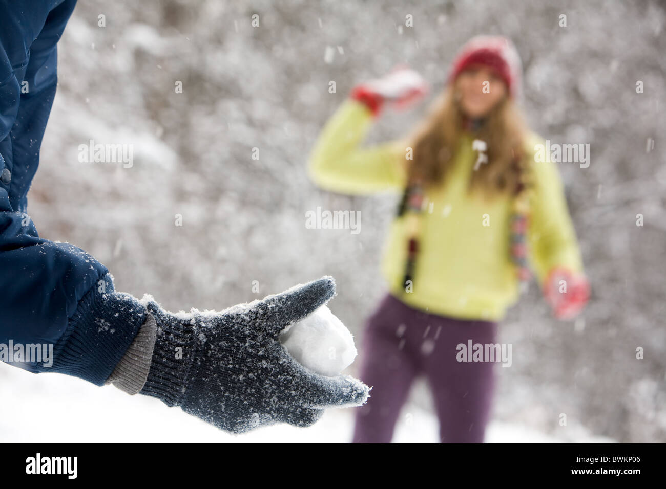 Man throwing snow girl hi-res stock photography and images - Alamy