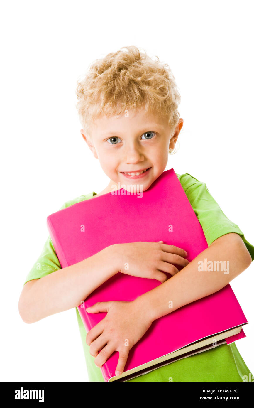 Portrait of schoolboy holding textbook on a white background Stock ...