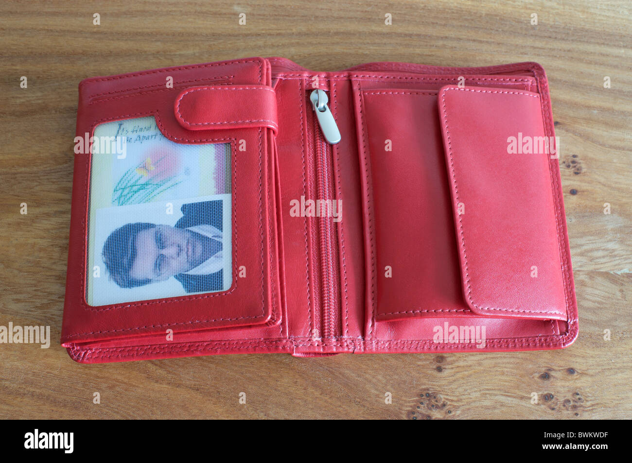 Woman's purse with photograph Stock Photo - Alamy