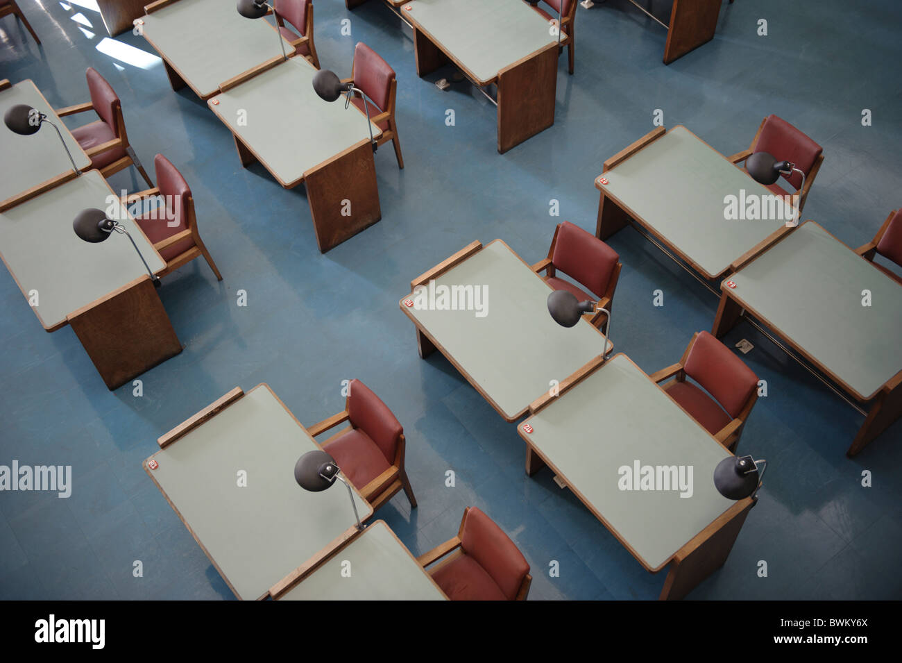 Desks and chairs at an empty library room in the Biblioteca Geral of ...