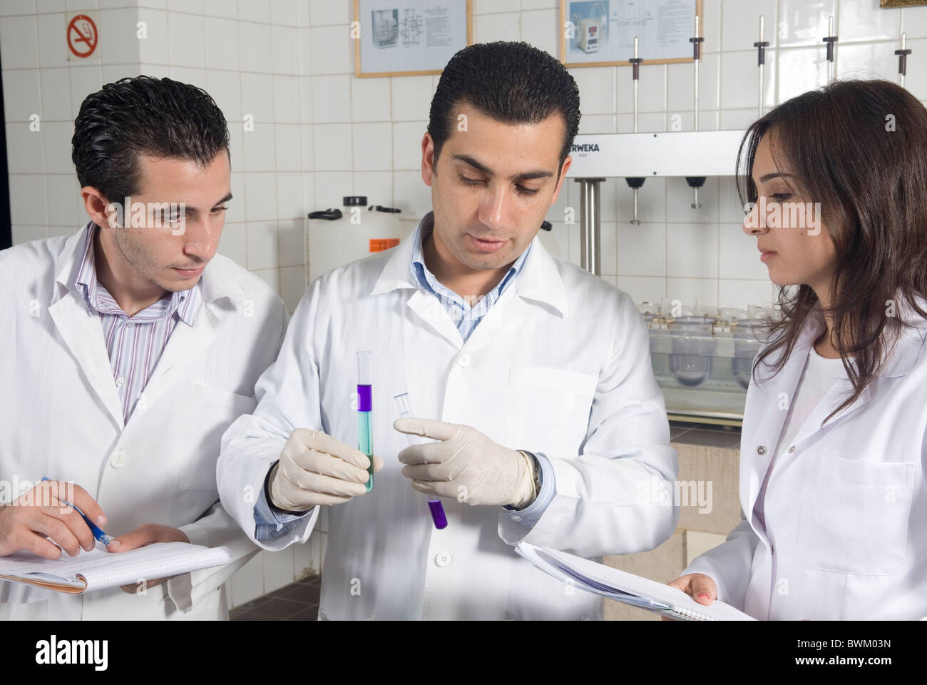 University instructor teaching students inside laboratory Beirut Arab ...