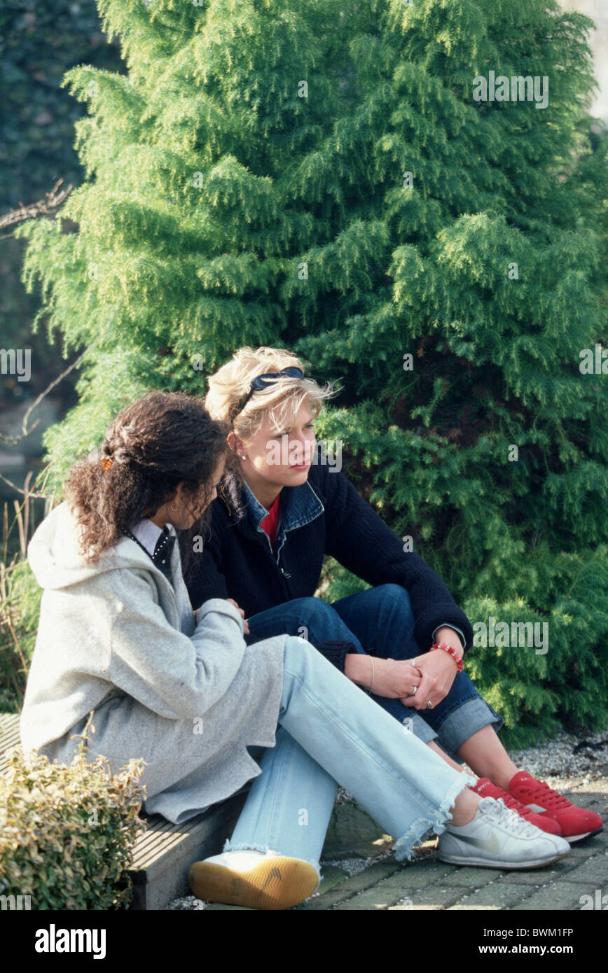 Friends soothing each other Stock Photo - Alamy