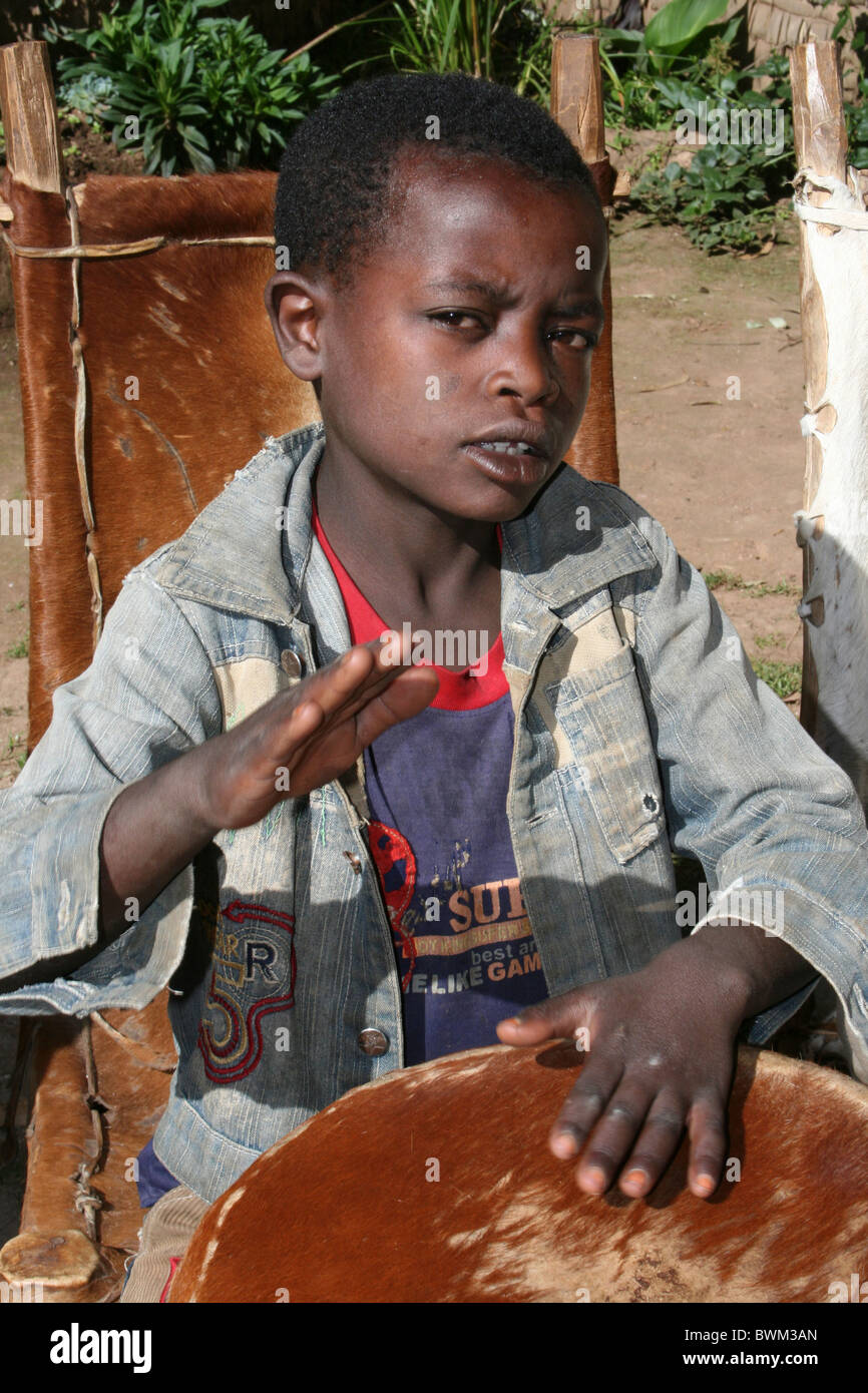 Dorze Tribe Boy Playing A Drum Taken In Chencha, Omo Valley, Ethiopia ...