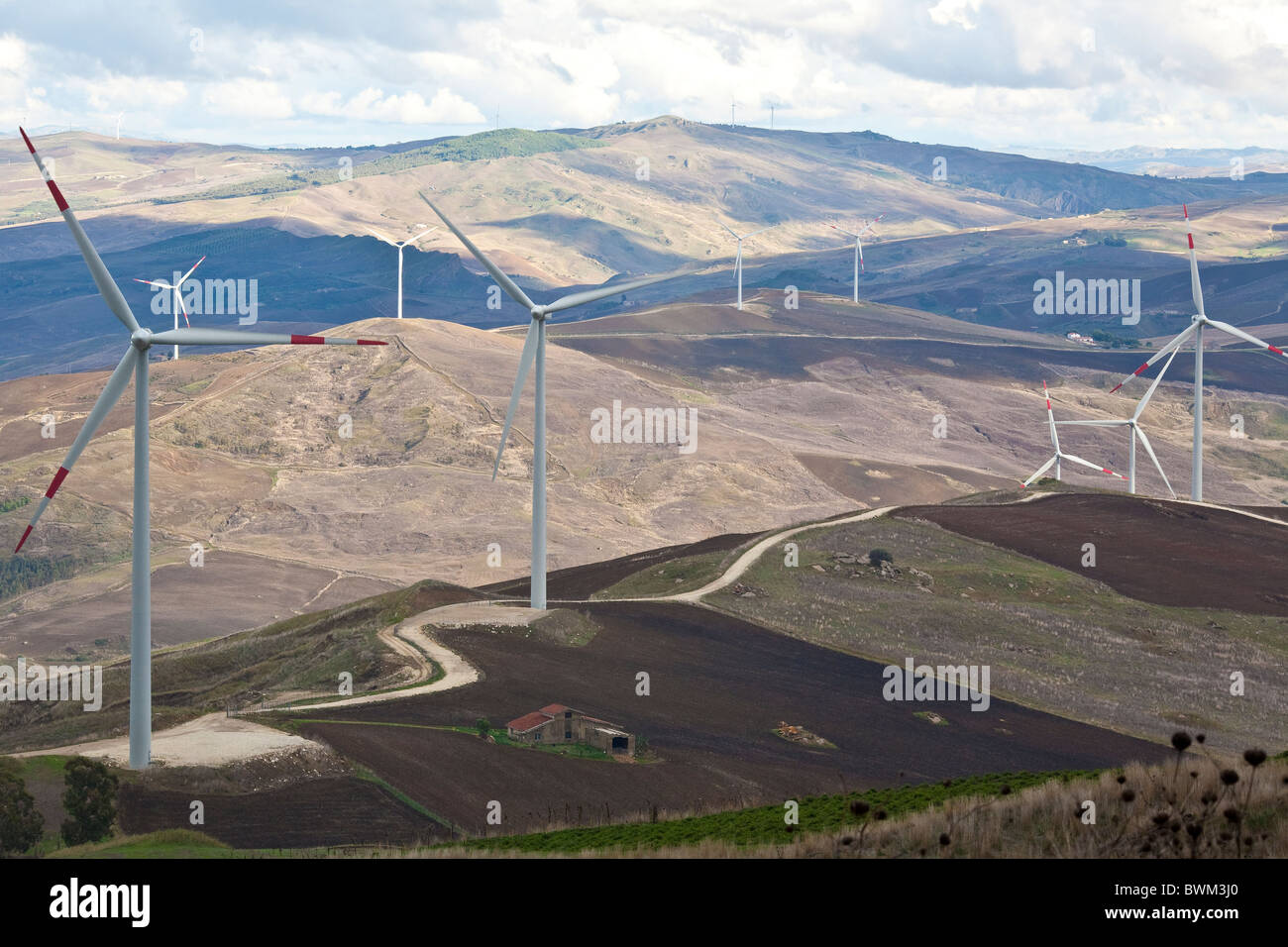 Wind turbines on wind farms dotted across the countryside in Alcamo ...