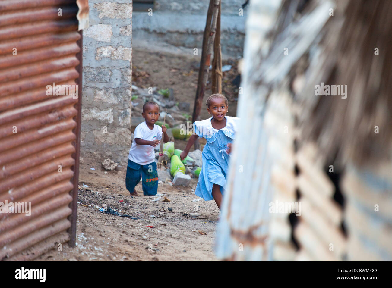 Girl running down the alley hi-res stock photography and images - Alamy