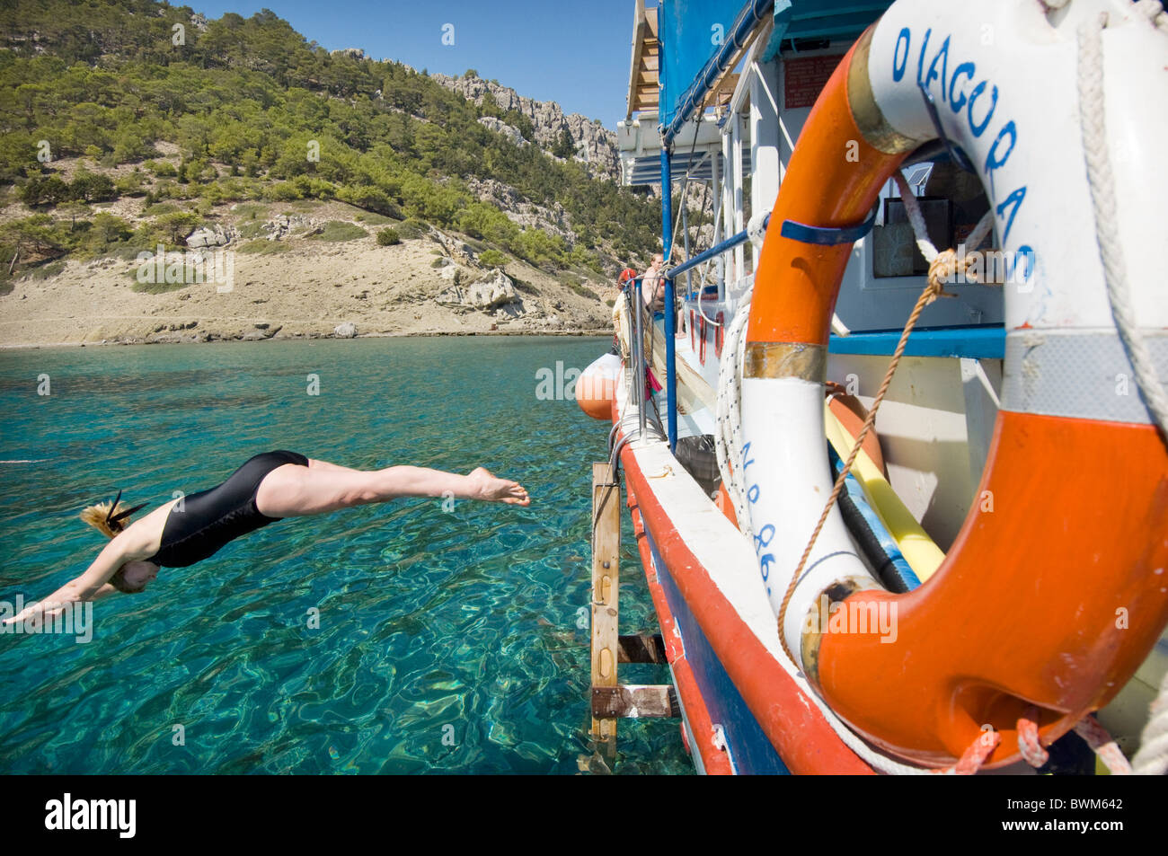 Woman in swimming costume hi-res stock photography and images - Alamy