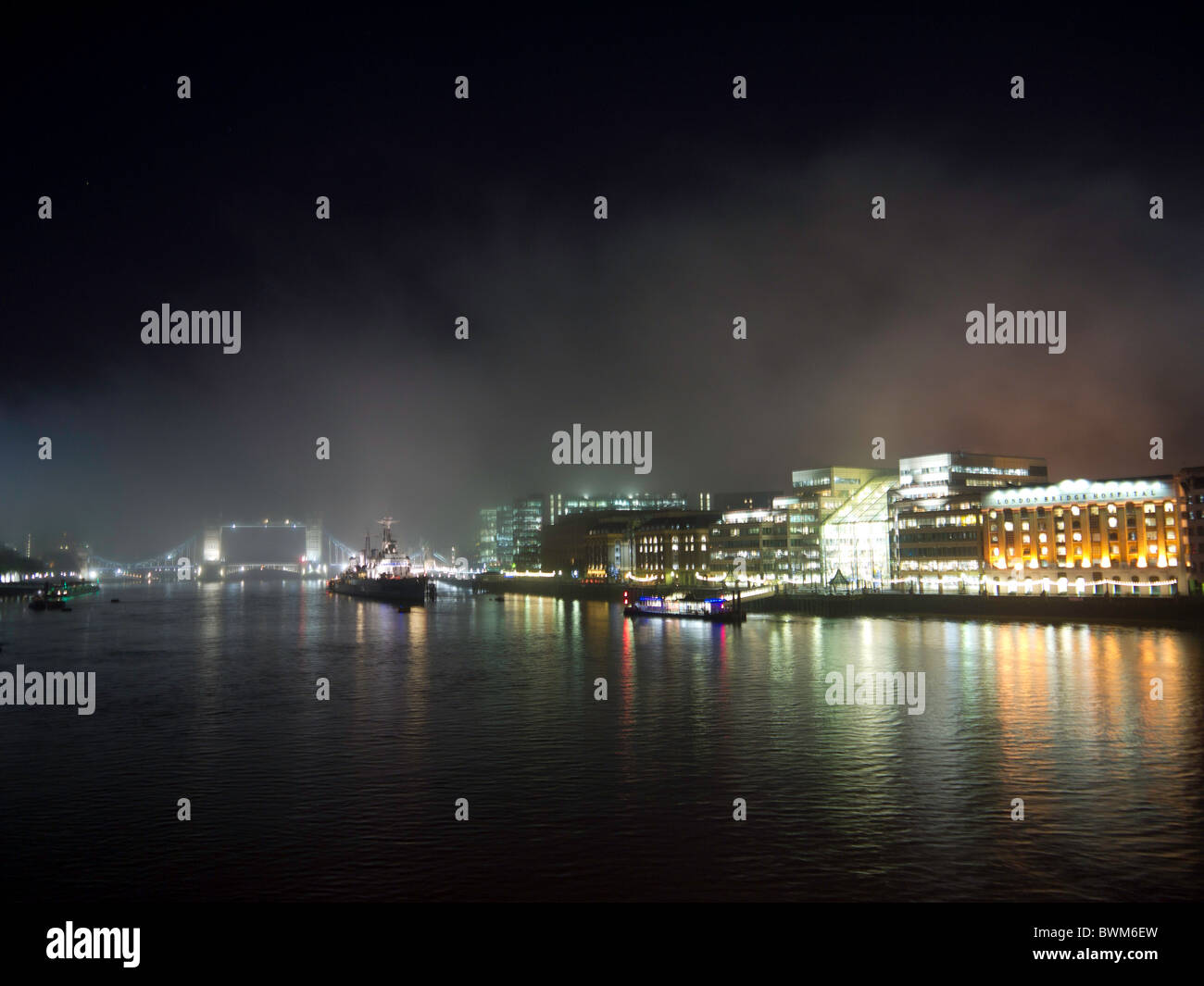 The view from London Bridge, as a mist rolls in over Tower Bridge and ...