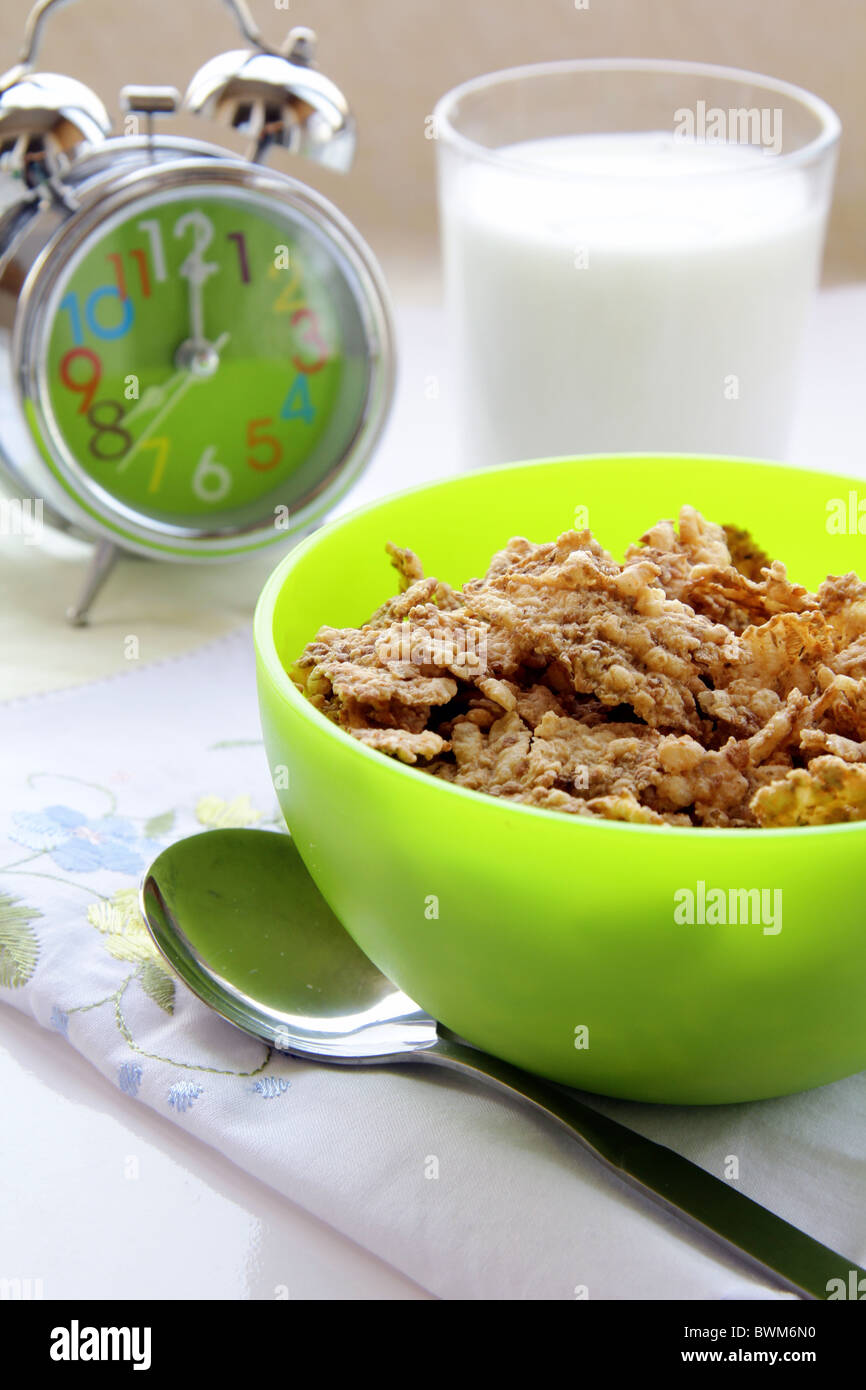 time for breakfast Muesli in a cup of green Stock Photo - Alamy