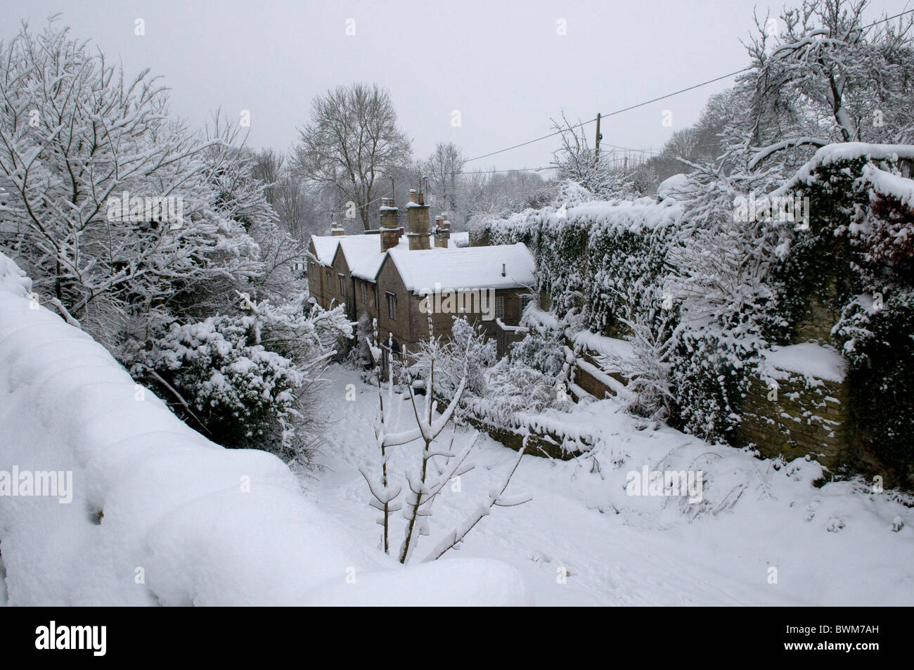 View of snow covered houses after a heavy snowfall Stock Photo - Alamy