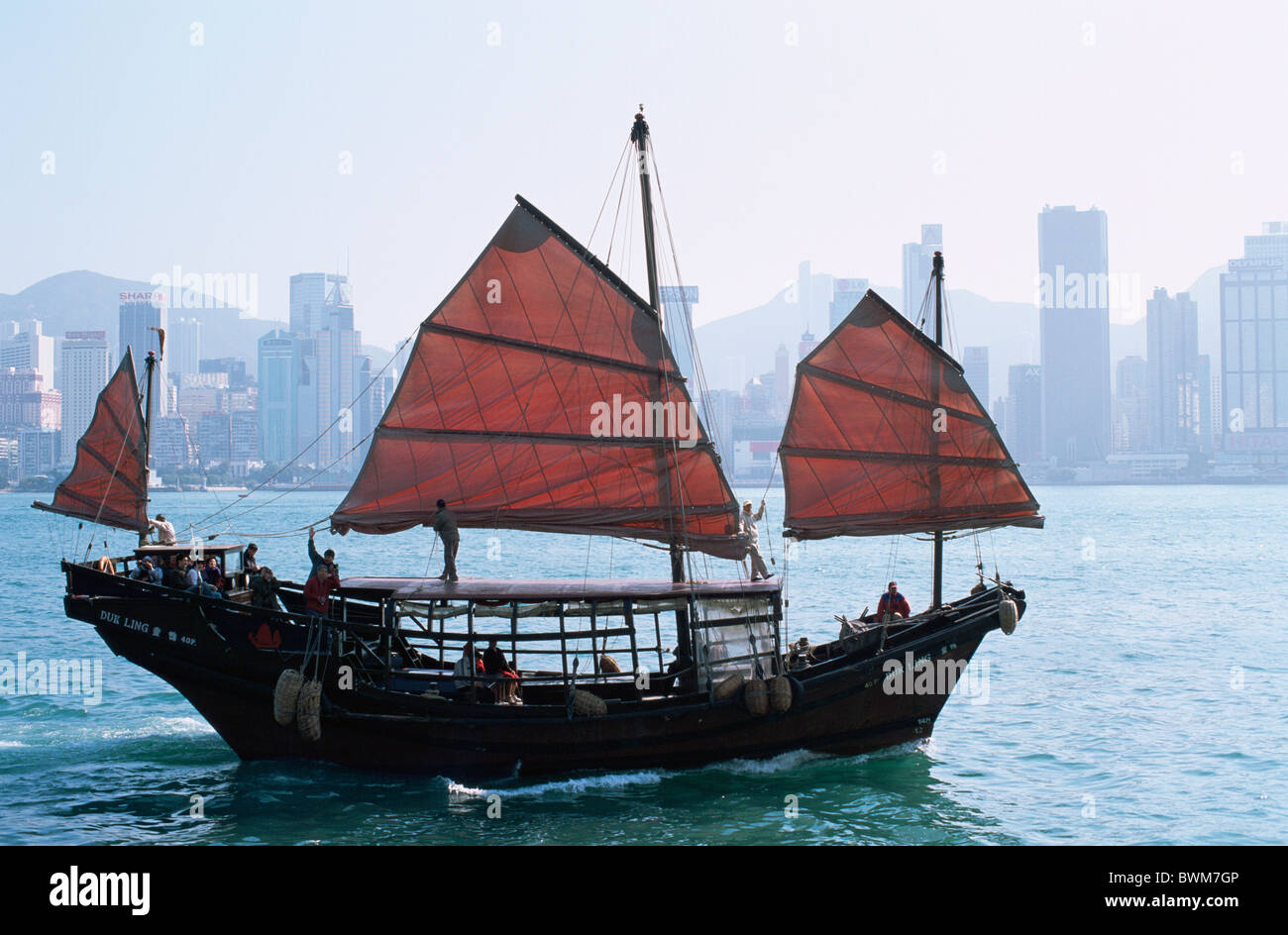 China Asia Hong Kong Victoria harbor harbor Junk Junks Boat Boats Sailboat City Skyline Stock ...