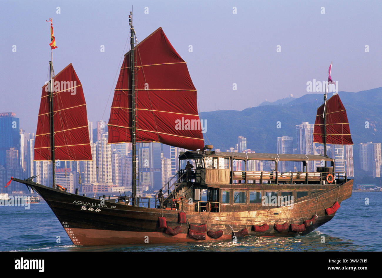 China Asia Hong Kong Victoria harbor harbor Junk Junks Boat Boats Sailboat City Skyline Stock ...