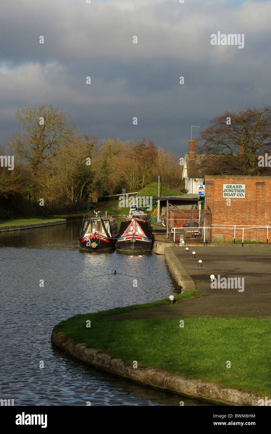 Two traditional narrowboats moored on the Grand Union Canal at ...