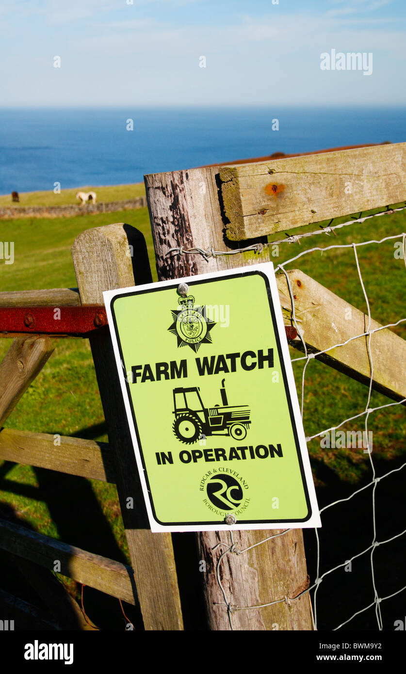 Farm Watch sign on farm gate on the north east coast between Saltburn ...