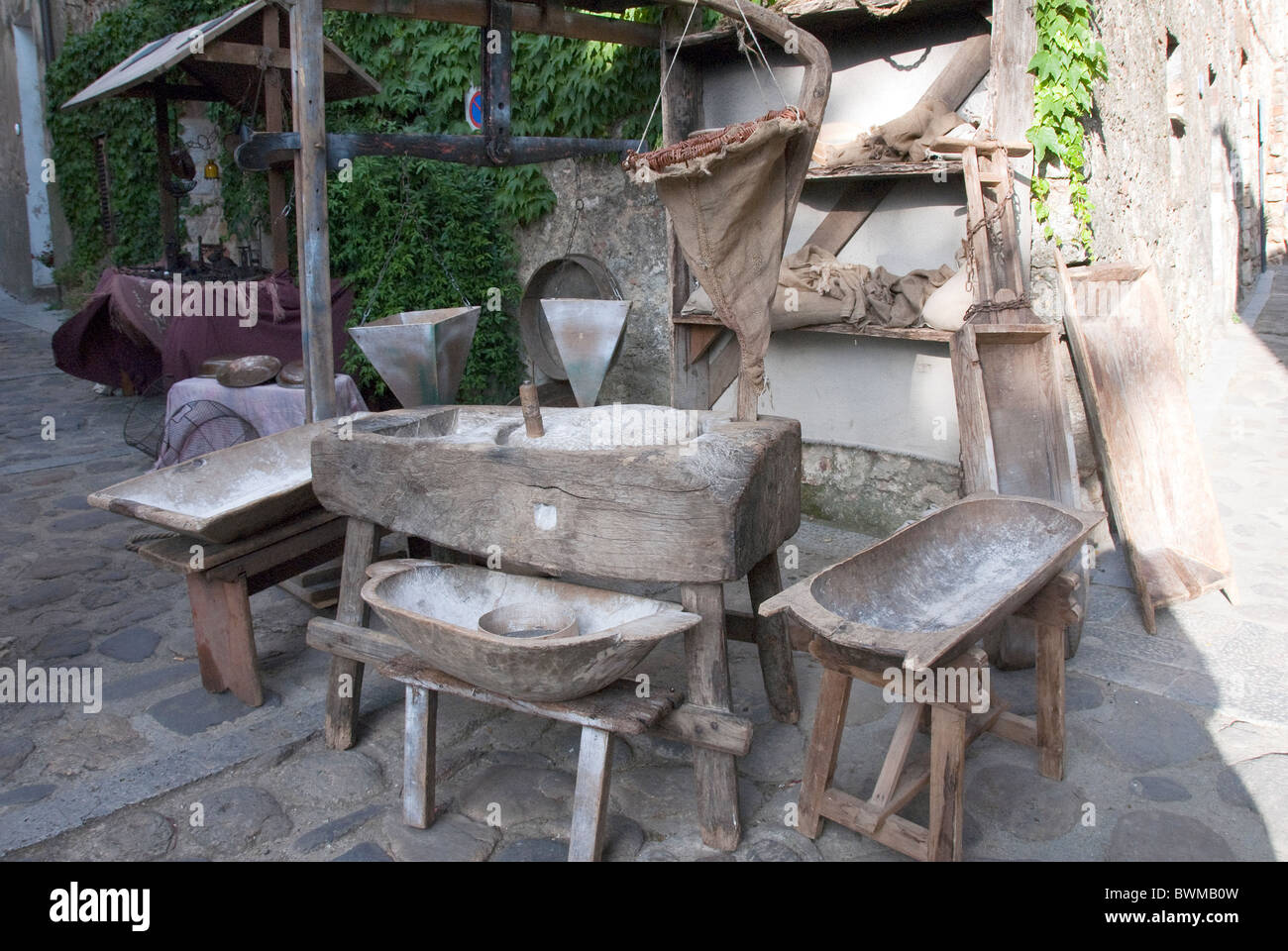 Wooden troughs for grinding cereal for flour at a Medieval Festival ...