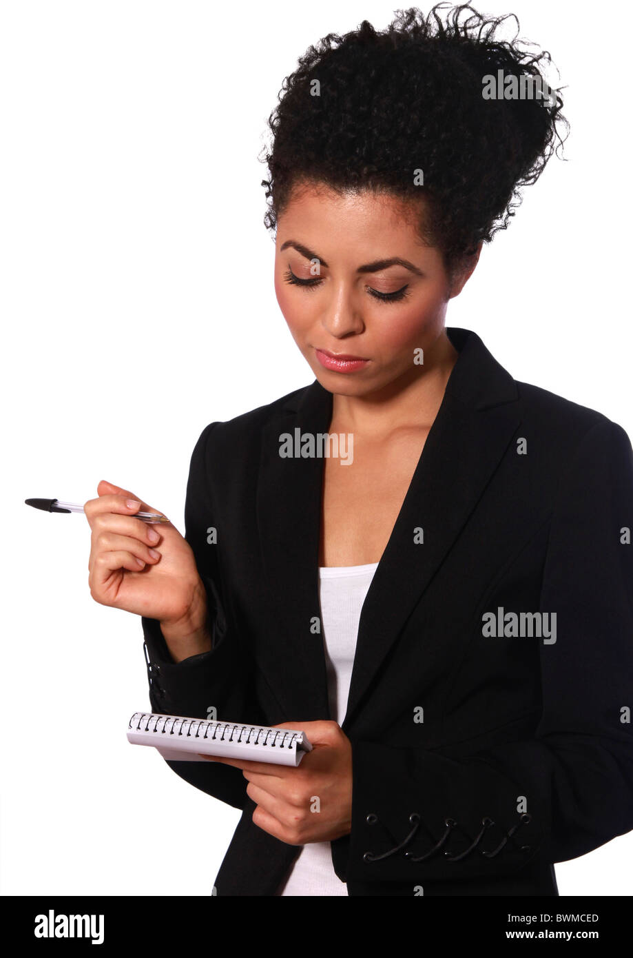 Young, mixed-race, business woman taking notes Stock Photo - Alamy