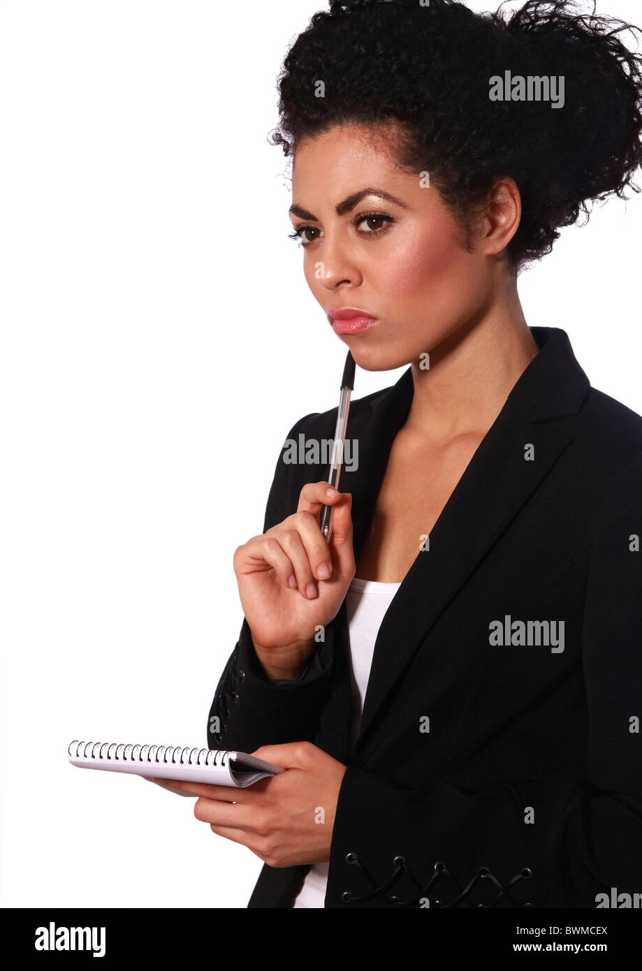 Young, mixed-race, business woman taking notes Stock Photo - Alamy