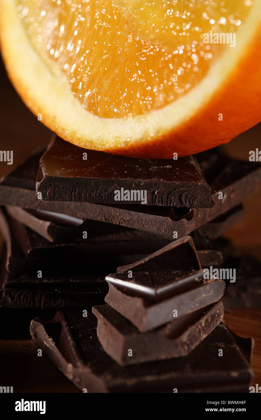 orange slice on stack of plain chocolate Stock Photo - Alamy