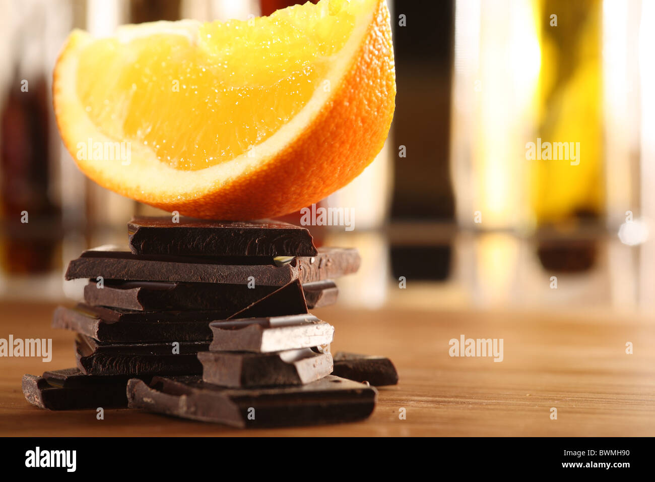 orange slice on stack of plain chocolate Stock Photo - Alamy