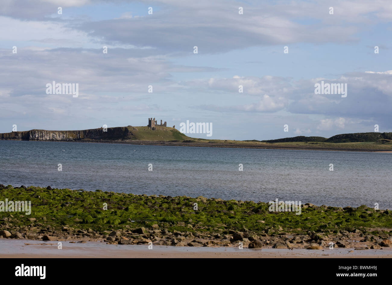 Dunstanburgh Castle from beach at Embleton Bay Embleton Northumberland ...