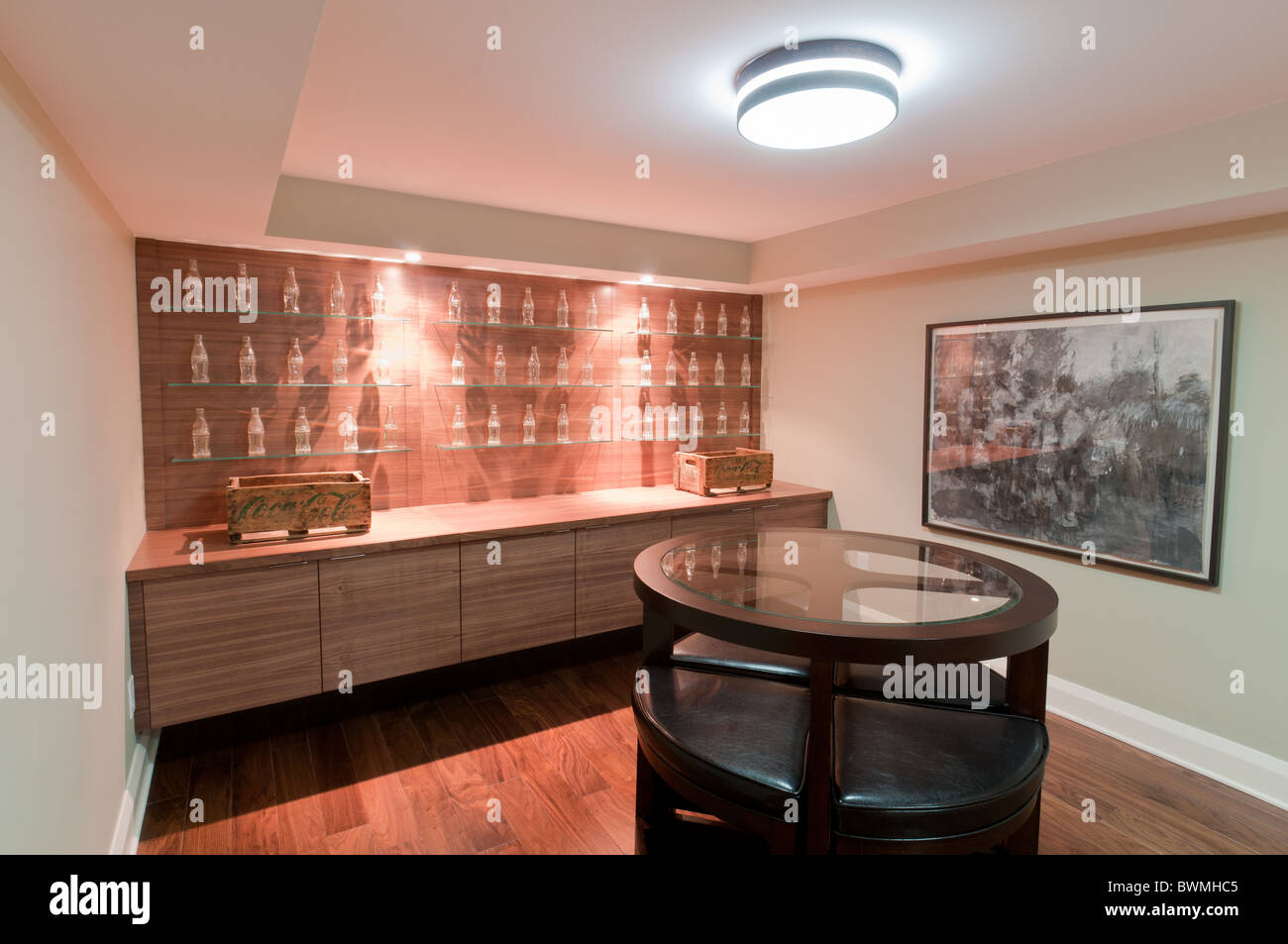 Artistic collectors display of Coca Cola bottles in a luxury ...