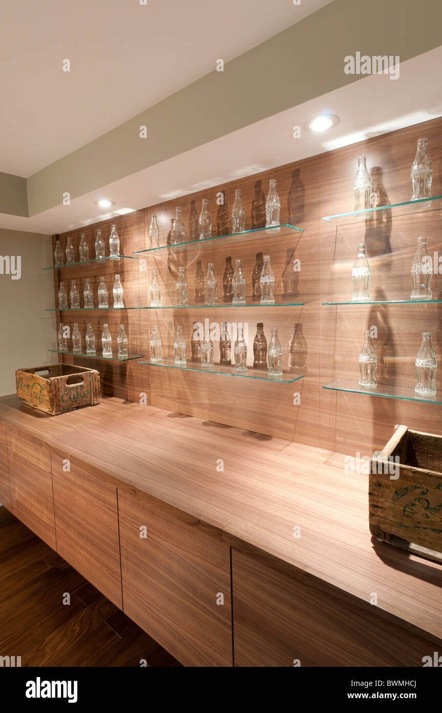 Artistic collectors display of Coca Cola bottles in a luxury ...