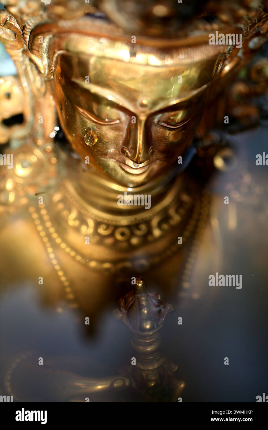 The Rising Buddha with tears of compassion and suffering Stock Photo ...