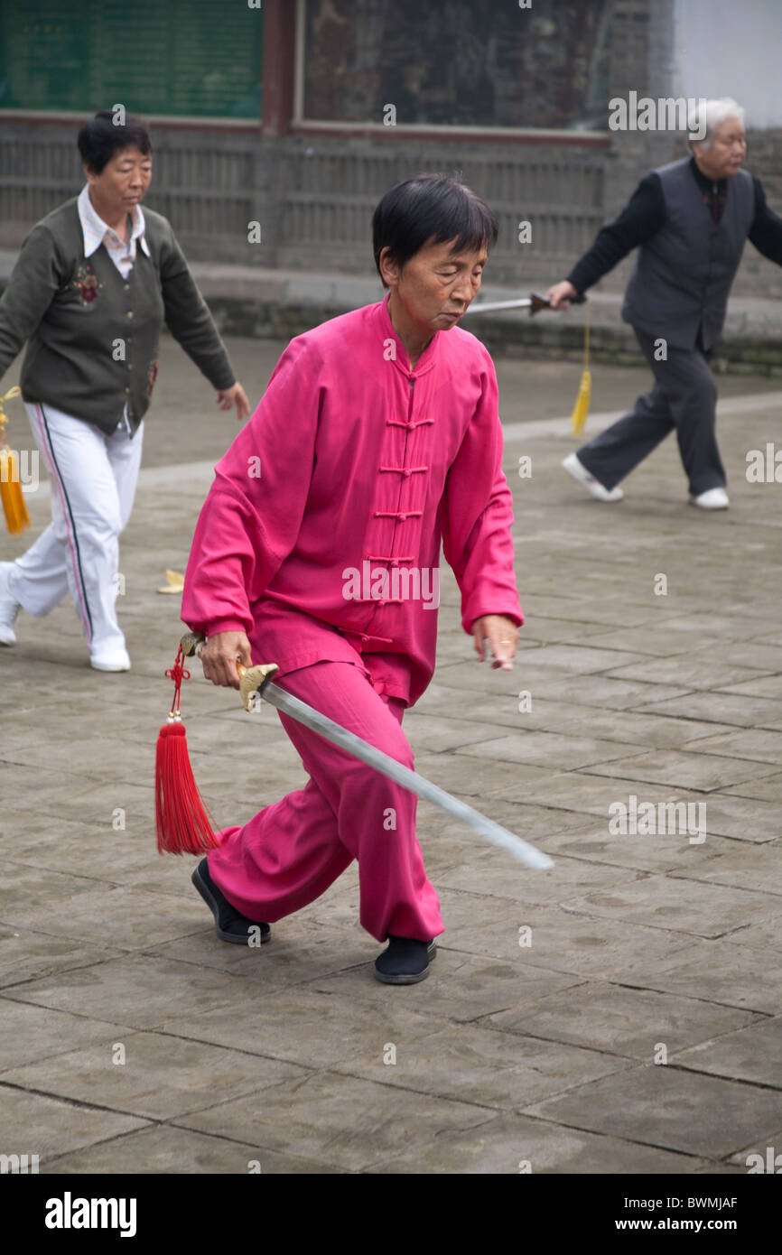 Woman performing slow tai chi hi-res stock photography and images - Alamy