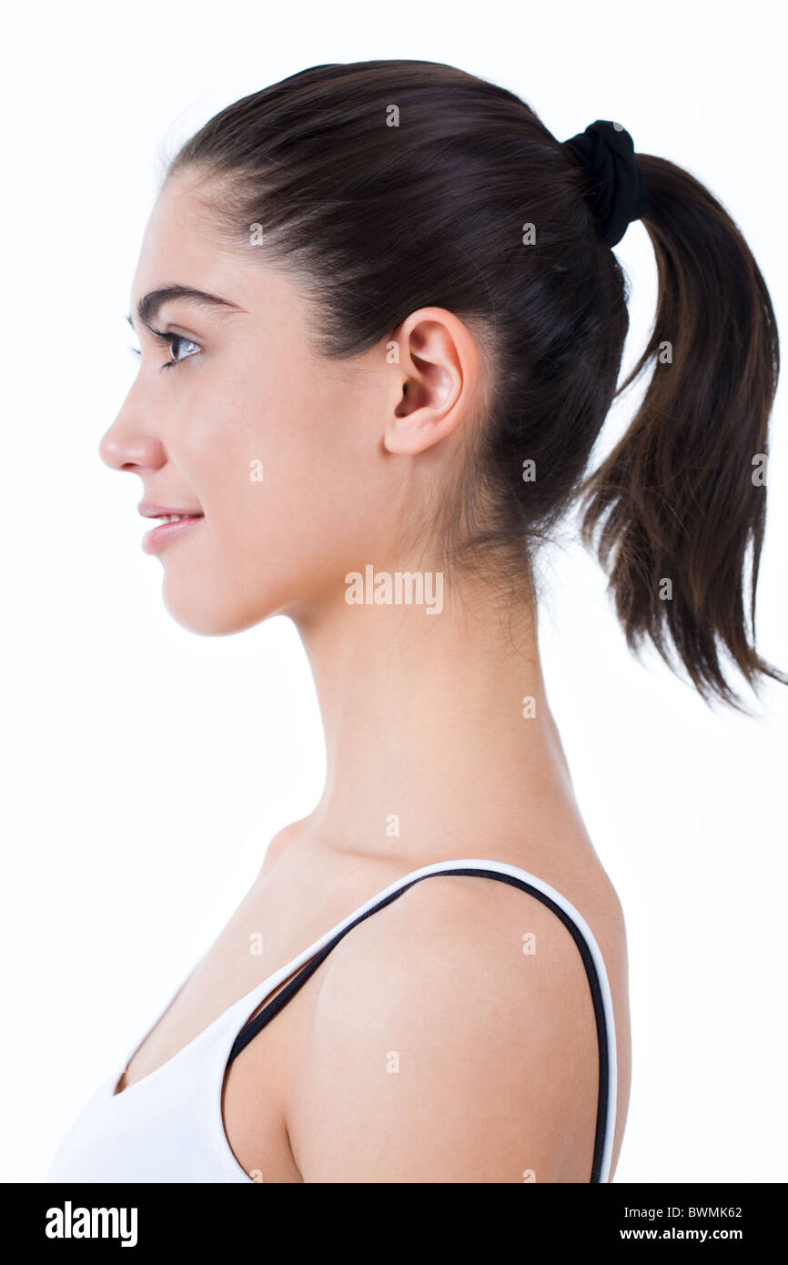 Profile of happy girl smiling over white background Stock Photo - Alamy