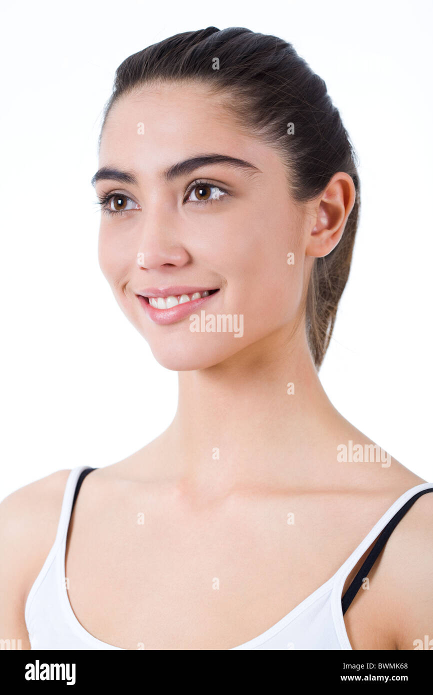 Fresh girl looking aside with happy smile over white background Stock ...