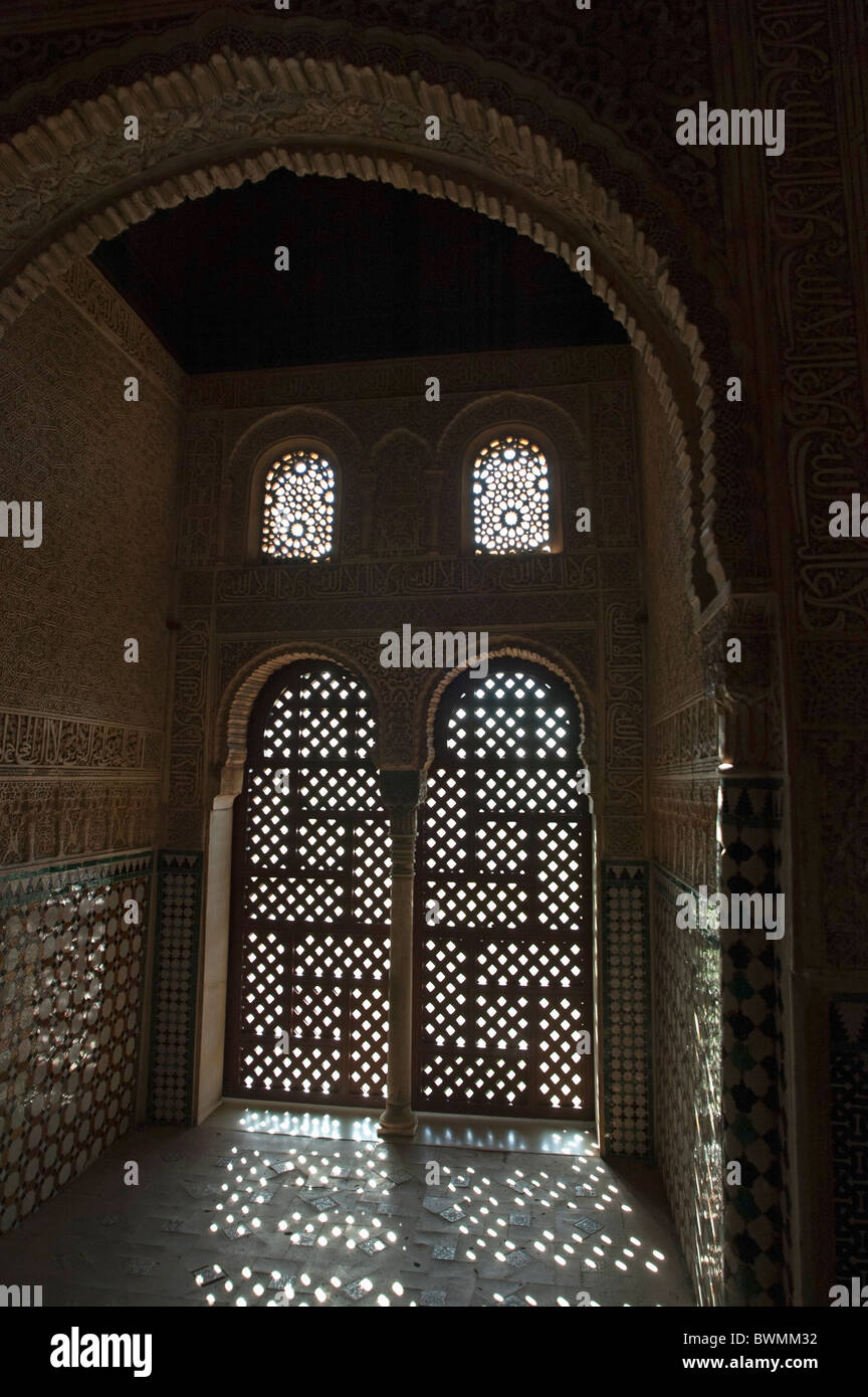 Sun shining through the intricate doors of the Tower of Comares in ...