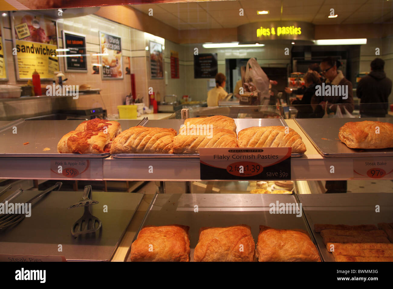Fast food shop window Stock Photo - Alamy
