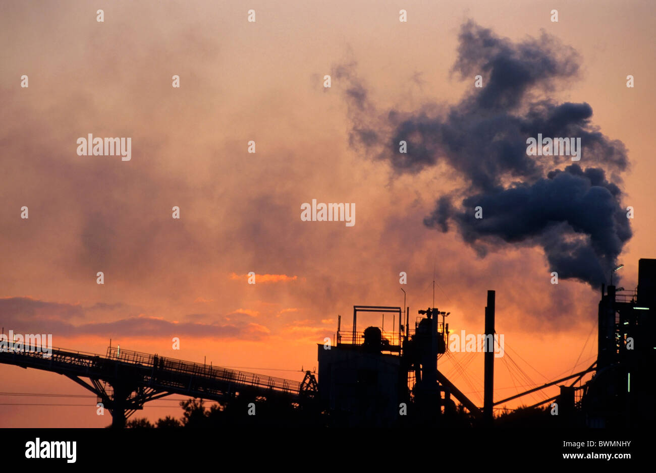 Silhouetted smokestack smoke hi-res stock photography and images - Alamy