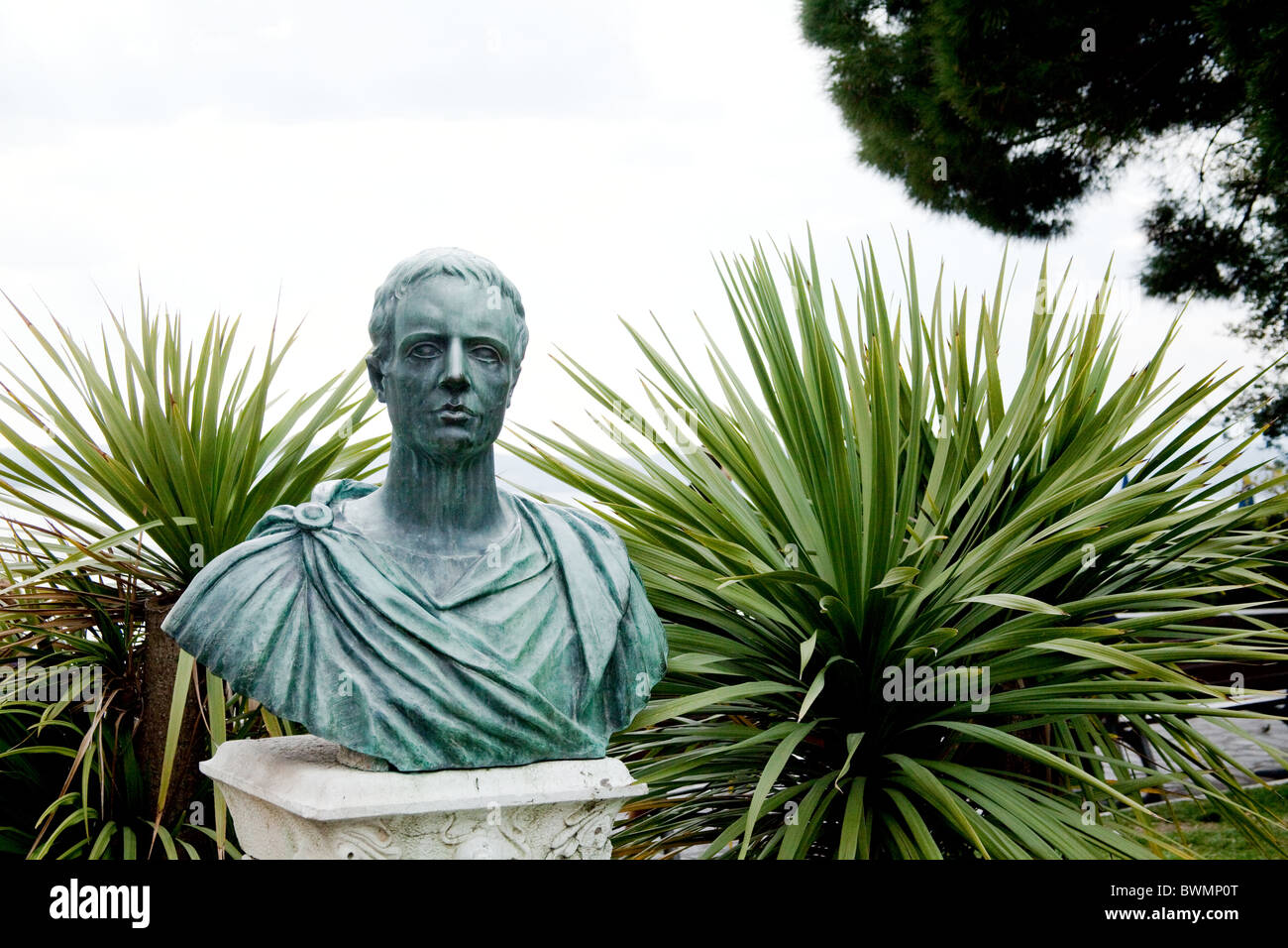 Bust of Roman poet Catullus on lake front of Lake Garda in town of ...