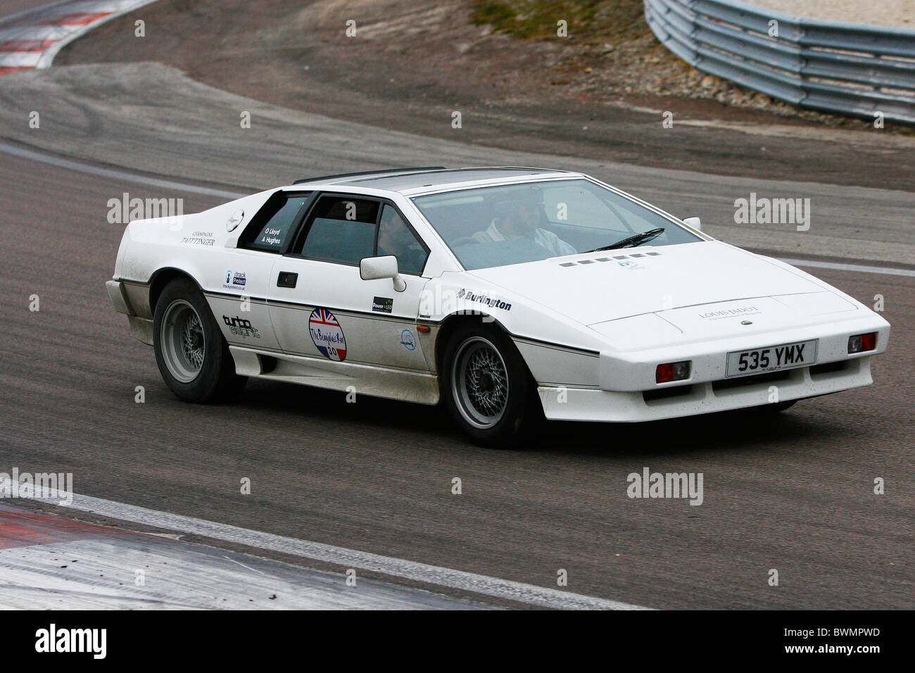 Lotus driving around the Dijon Prenois circuit Stock Photo - Alamy