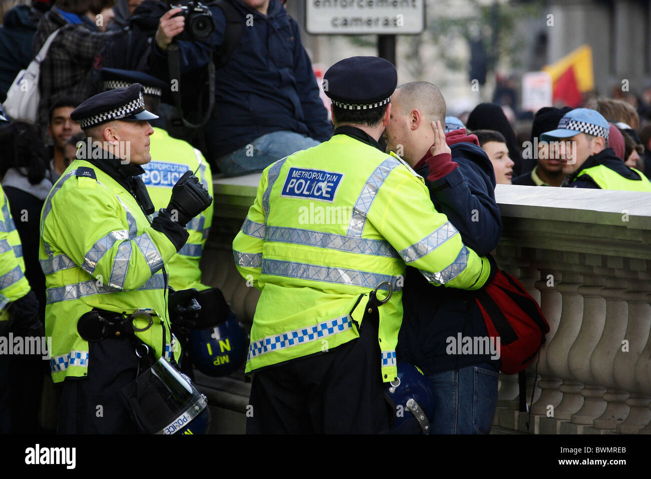 Police detain protester in Whitehall Stock Photo - Alamy