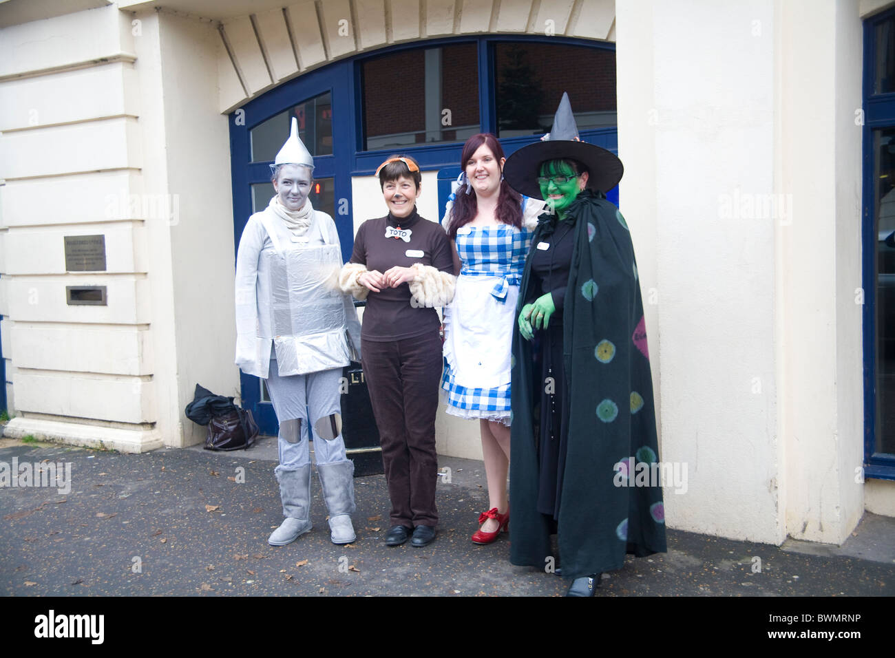 Four women in fancy dress costumes Stock Photo - Alamy