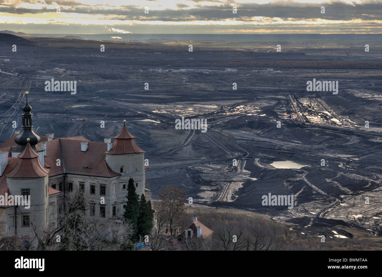 Coal opencast mine with old castle in the foreground Stock Photo - Alamy