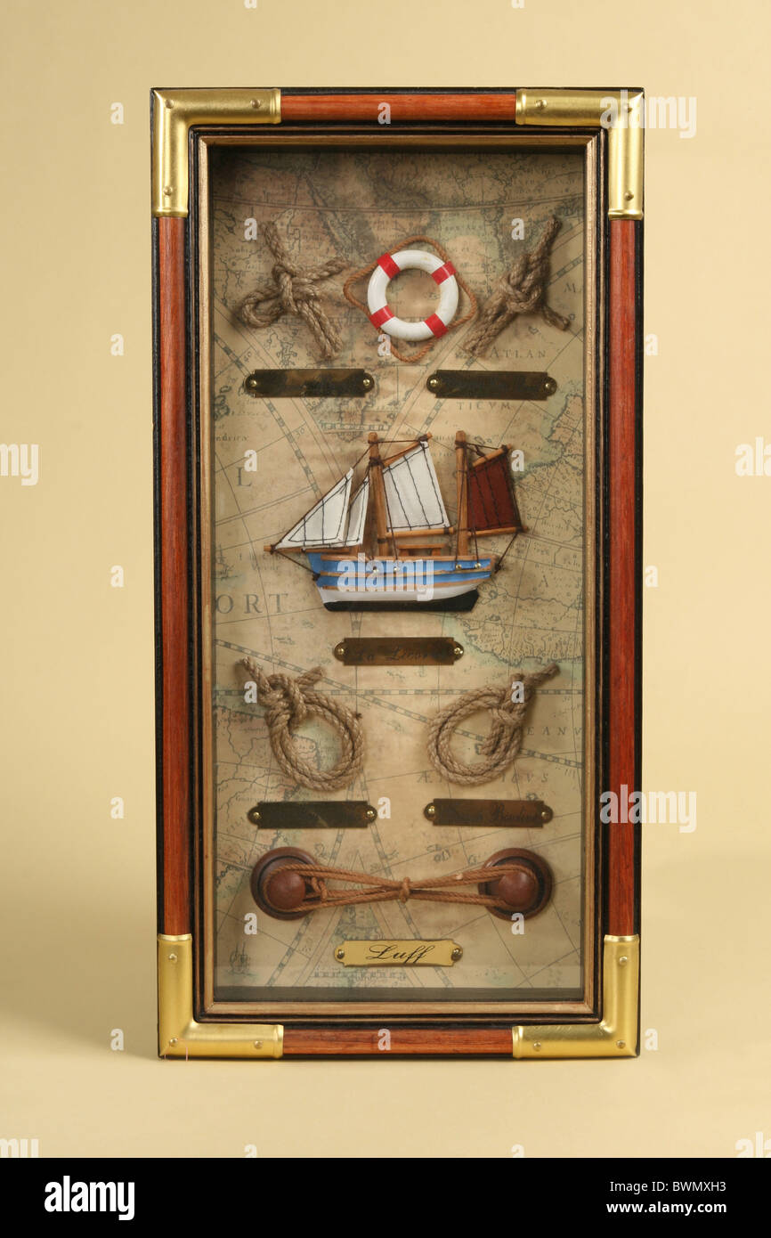 Accessory of sailor - souvenir in wooden frame Stock Photo - Alamy