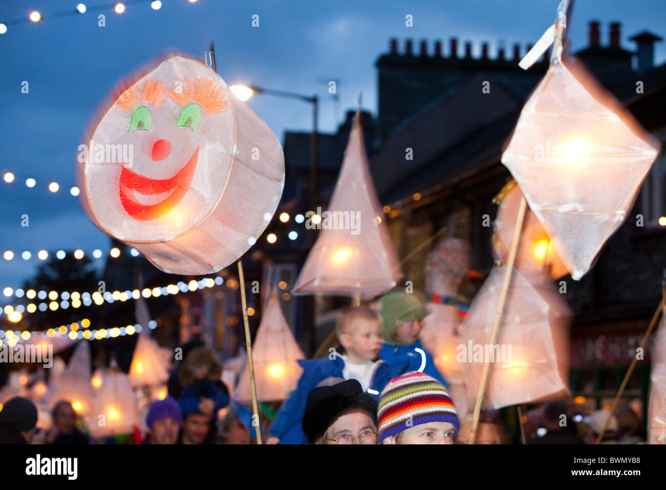 A lantern festival procession at the Christmas lights switch on in ...