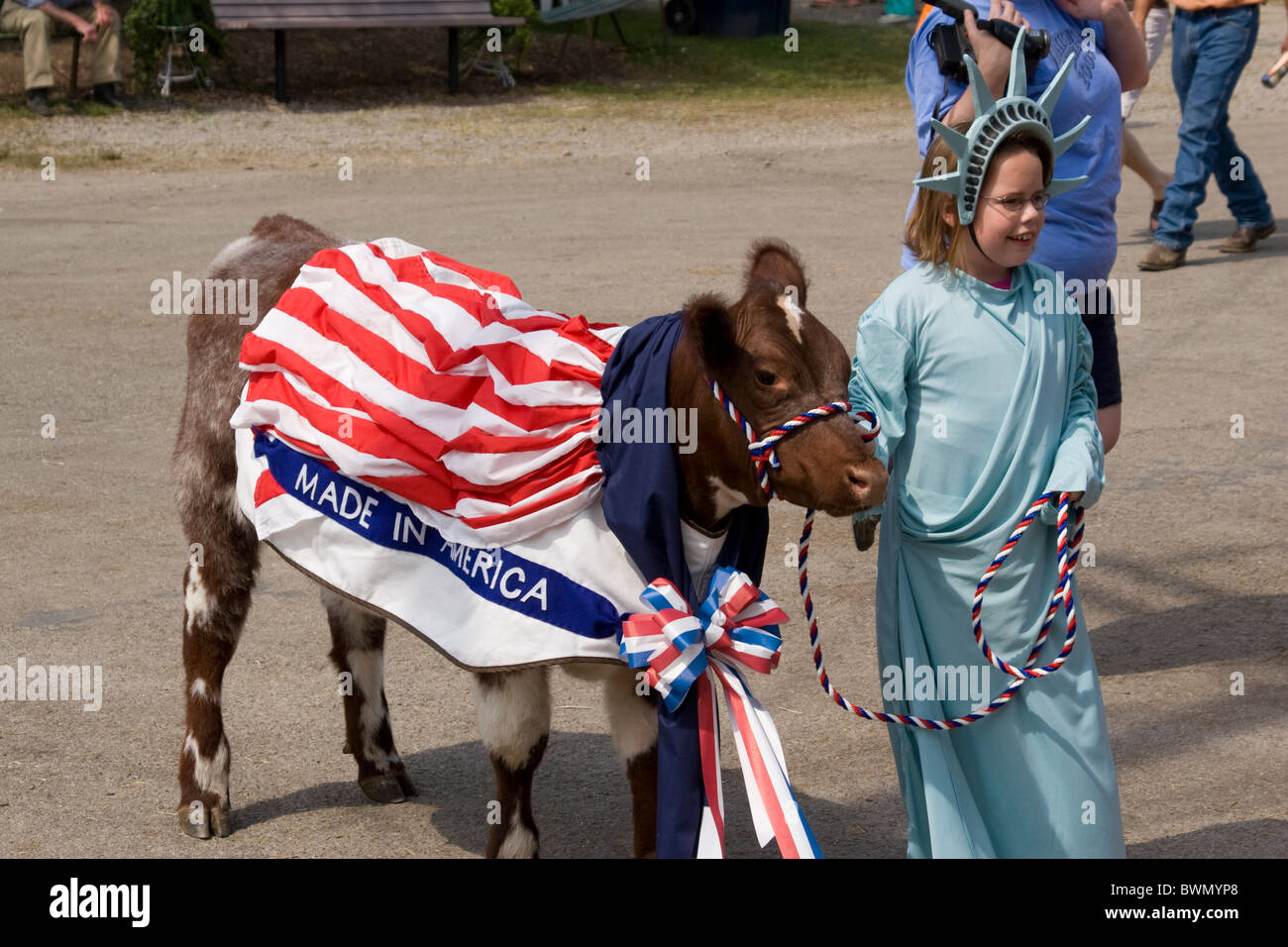 Dress A Cow Contestant. Made In America calf with young girl Statue Of ...