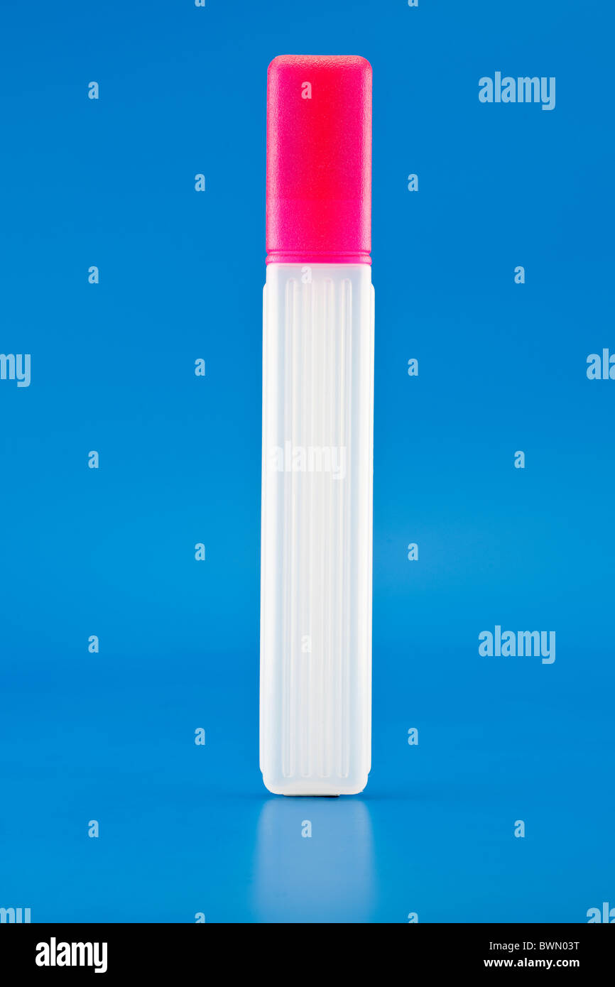 Long plastic red topped container Stock Photo - Alamy