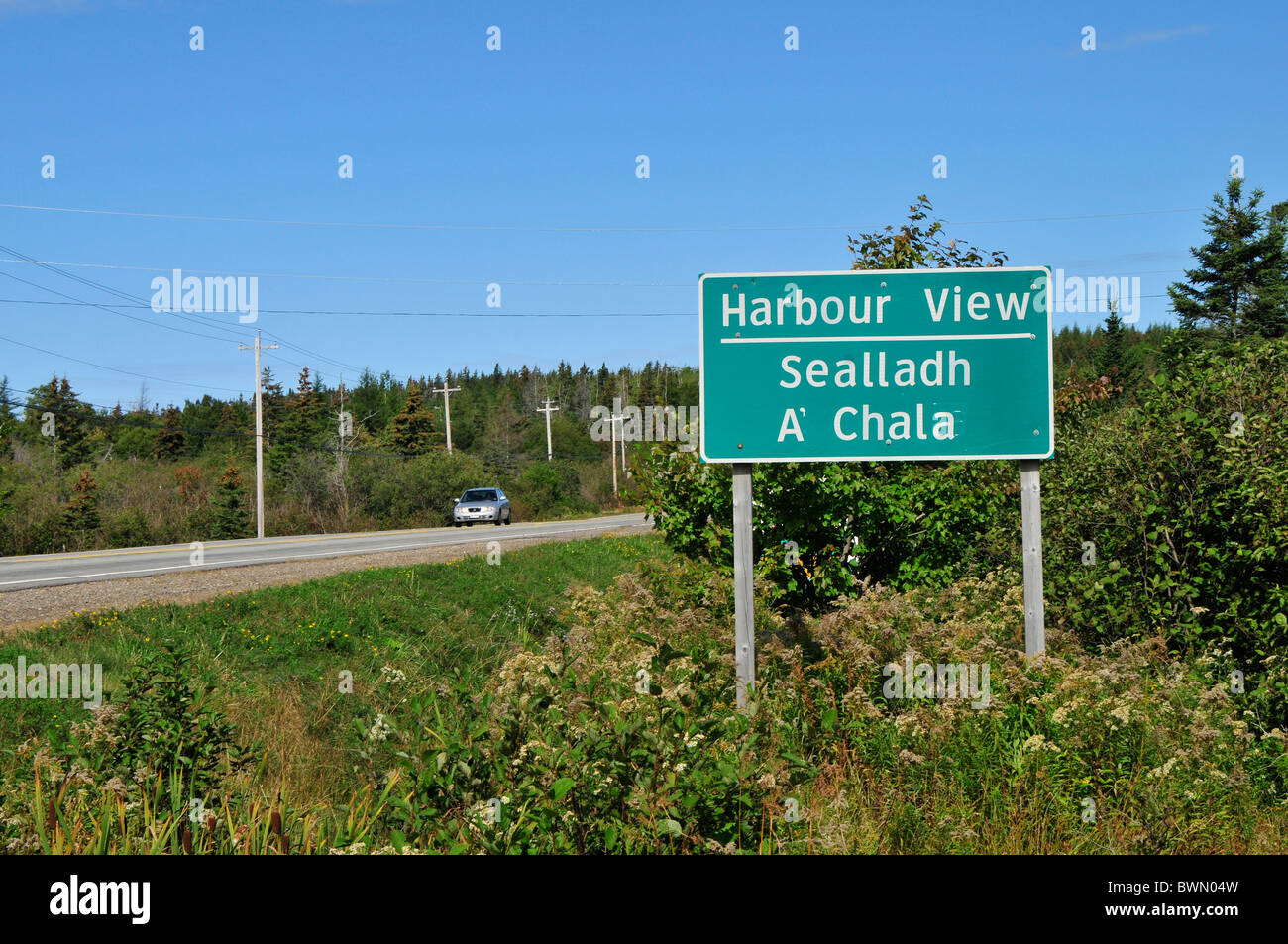 A highway traffic bilingual road sign in English and Celtic in Cap ...