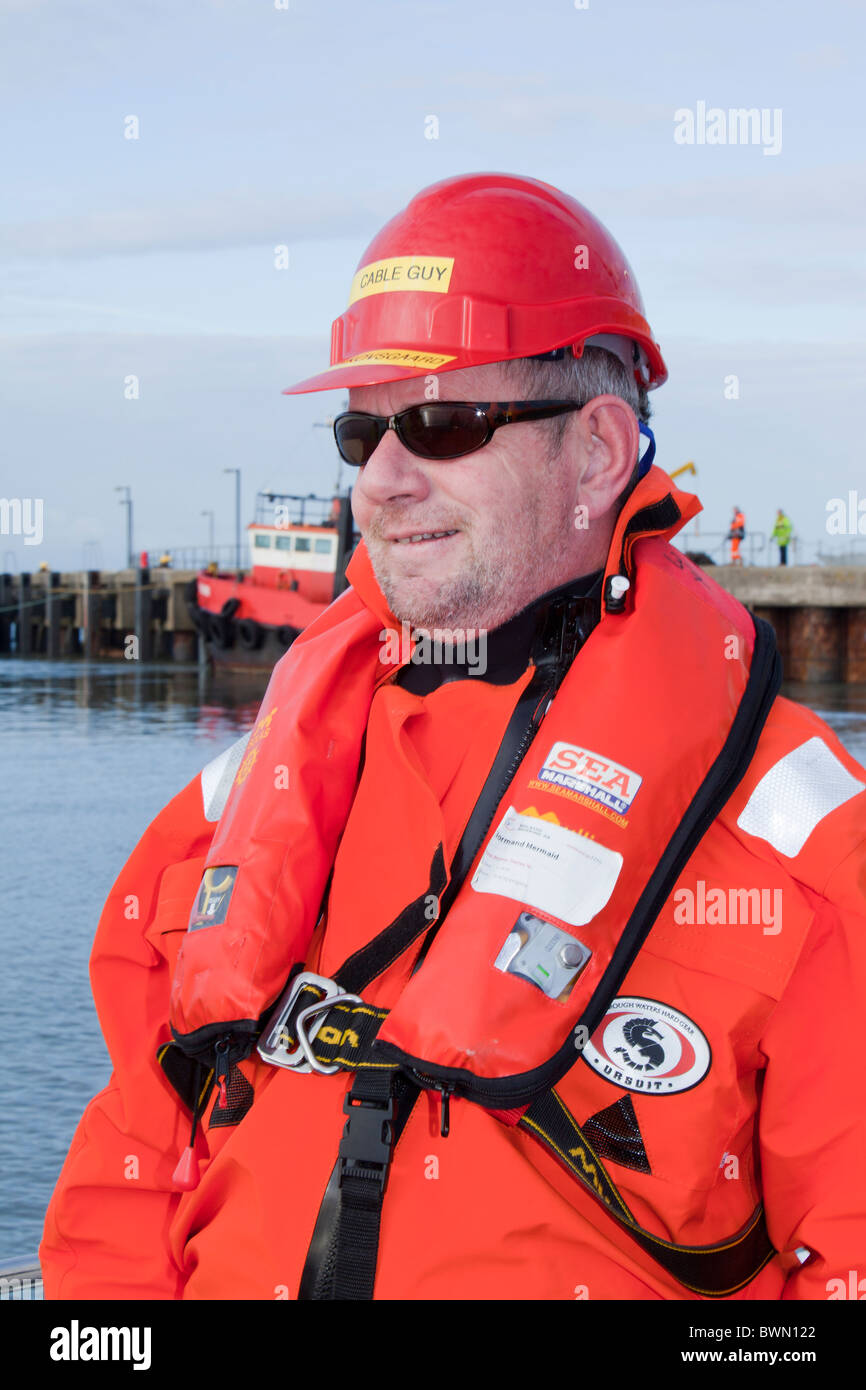 An offshore worker on his way out to the Walney offshore wind farm ...