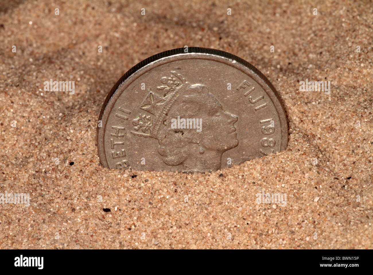 Fijian coin in the sand Stock Photo - Alamy