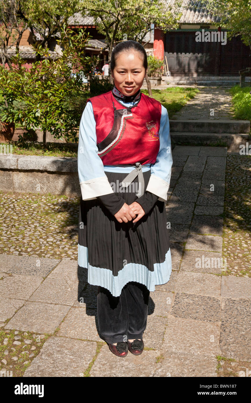 Young Naxi woman wearing traditional costume, Baisha village, near ...